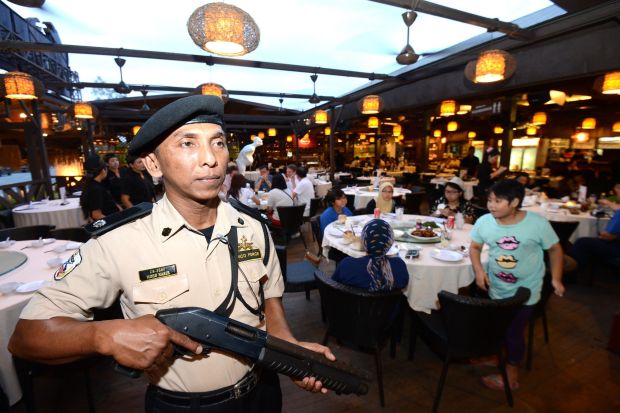 Security Guard patrolling restaurant – THEAsiaN